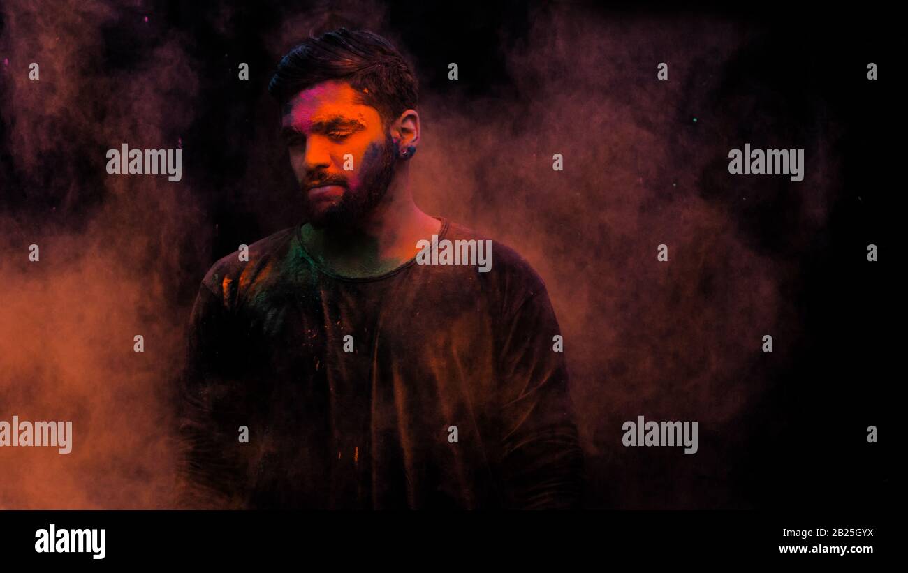 Young man in holi colors. holi is a festival of India. It is festival ...