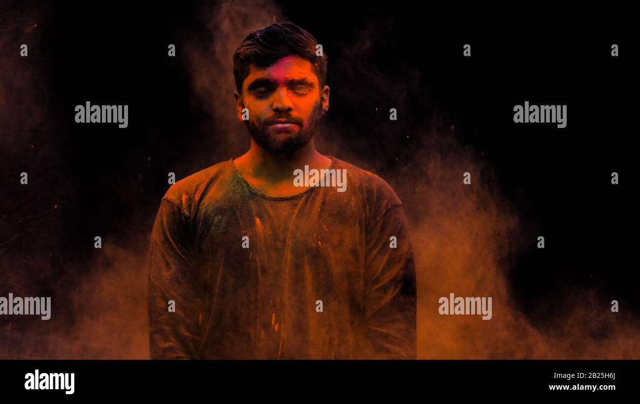 Young man in holi colors. holi is a festival of India. It is festival ...