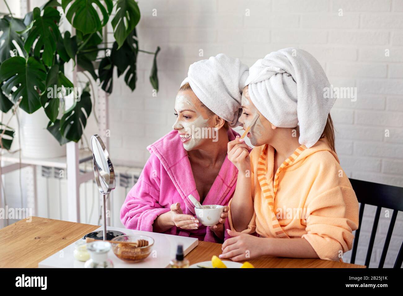 Kid mom facial mask hi-res stock photography and images - Alamy