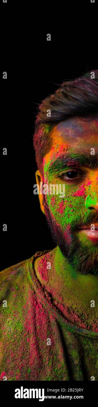 Young man in holi colors. holi is a festival of India. It is festival ...