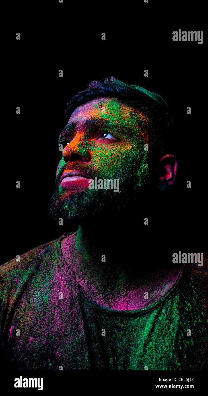 Young man in holi colors. holi is a festival of India. It is festival ...