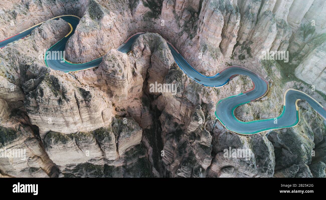 aerial view of a steep mountain road Stock Photo - Alamy