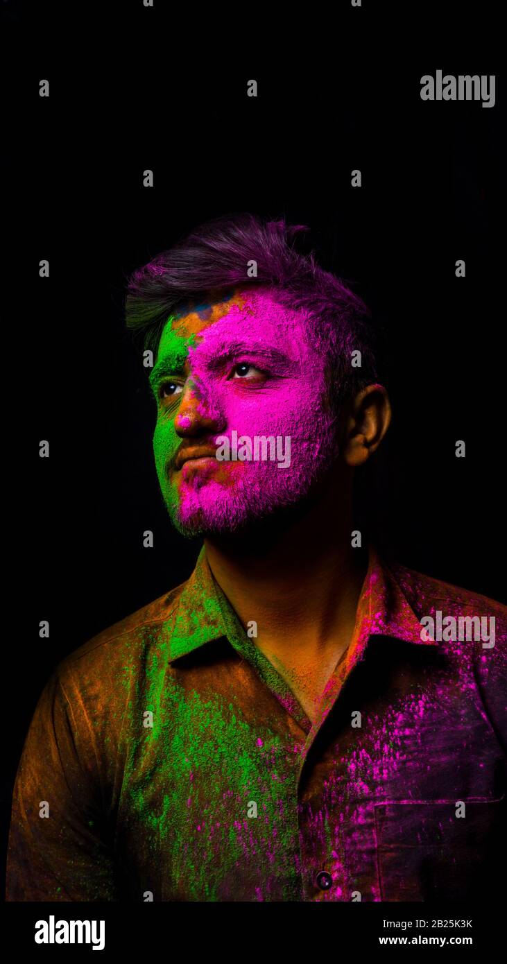 Young man in holi colors. holi is a festival of India. It is festival ...
