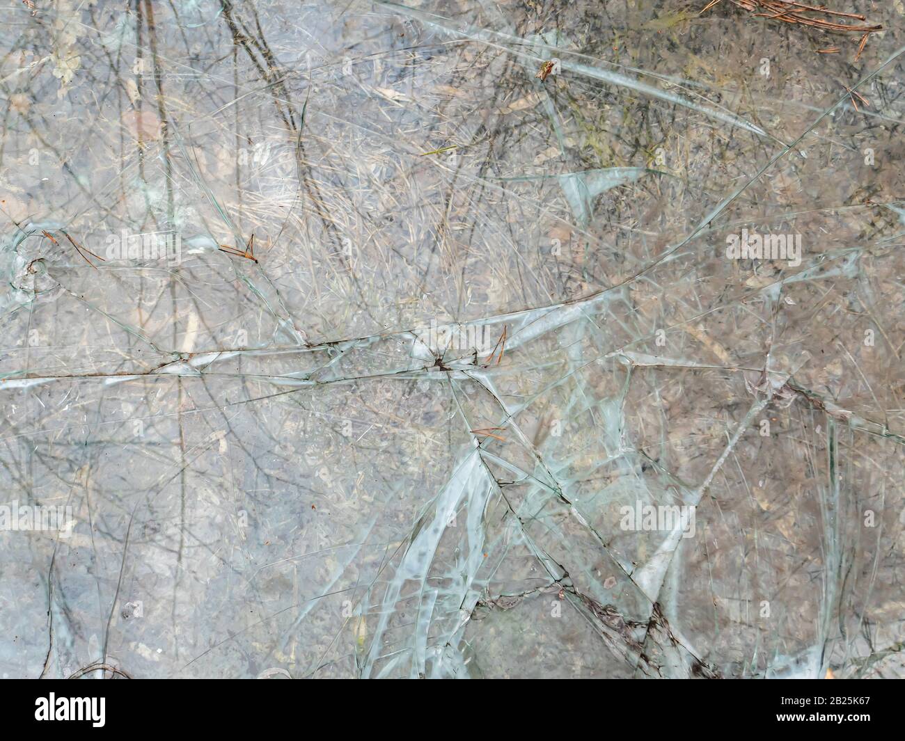 The glass surface is broken into small fragments Stock Photo - Alamy