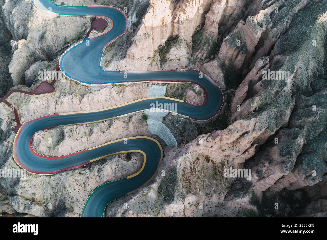 aerial view of a steep mountain road Stock Photo - Alamy