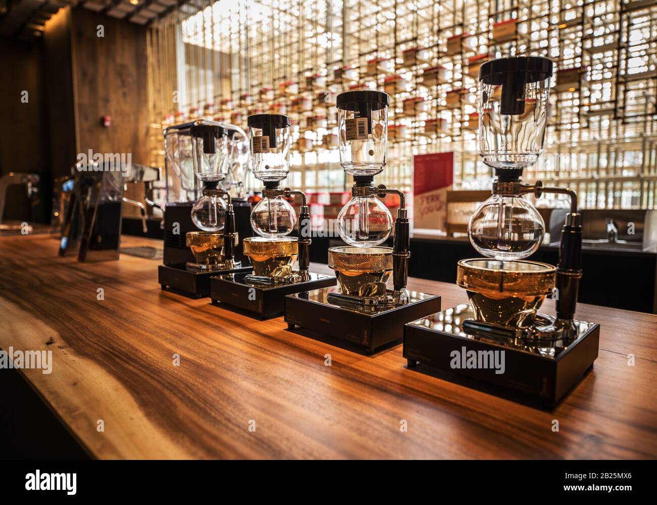BEIJING, СHINA - JUNE 01, 2019: Modern models of glass coffee machines ...
