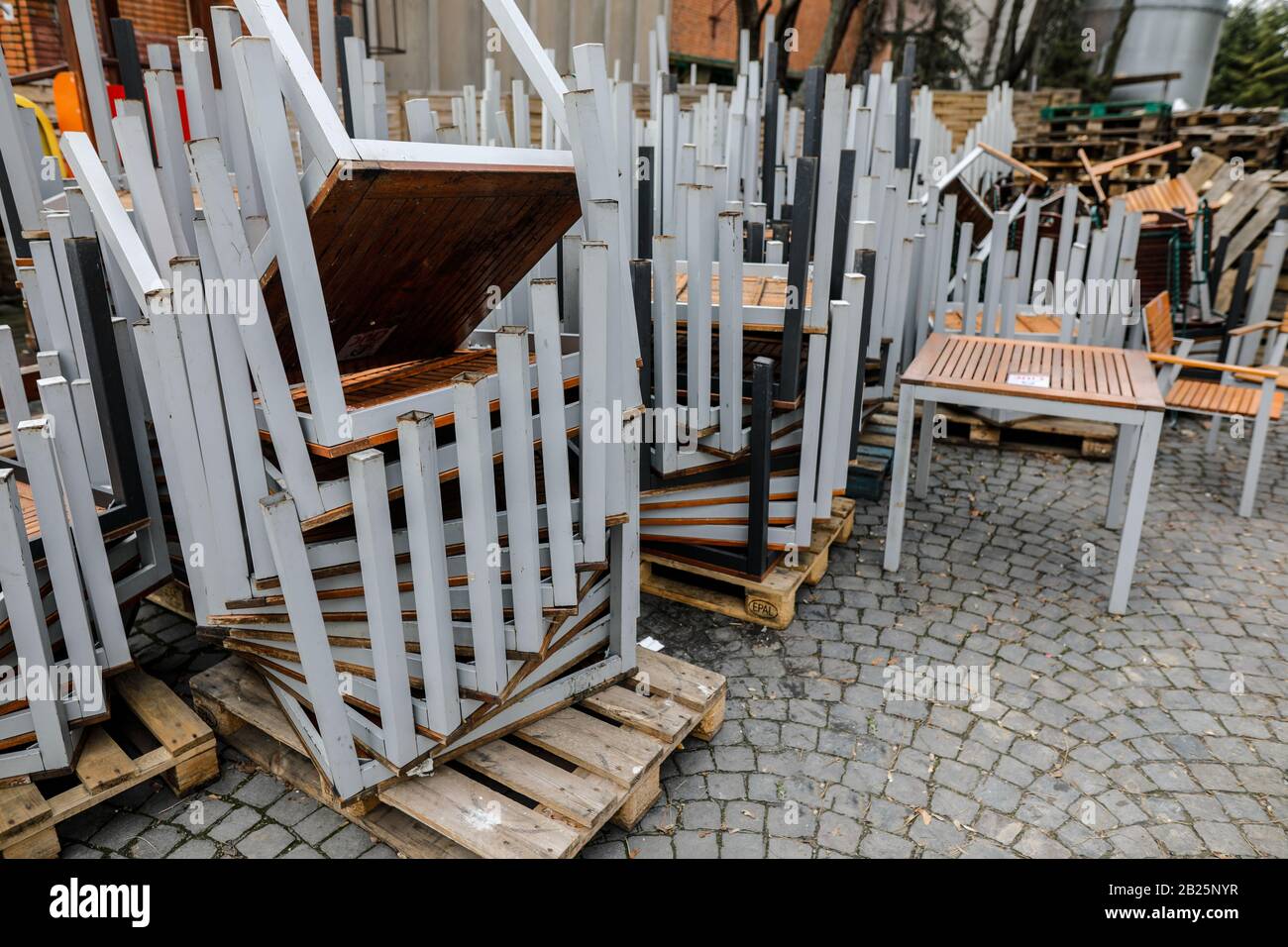 Pile of tables hi-res stock photography and images - Alamy