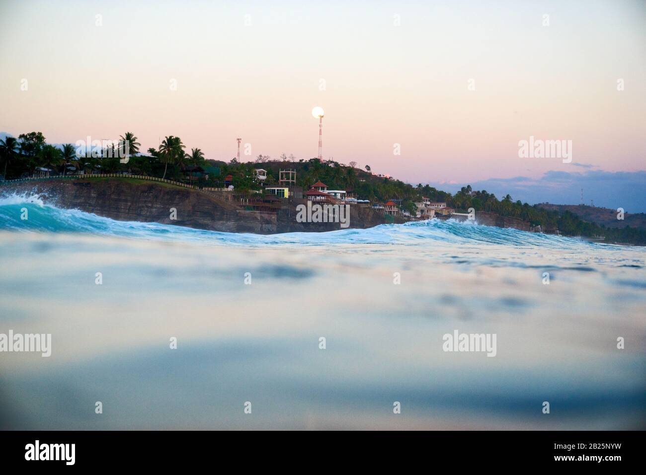 Full moon ocean waves Stock Photo - Alamy