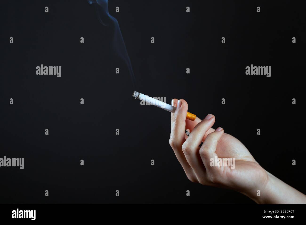 Smoking smoker cigarette smoke fire hi-res stock photography and images ...