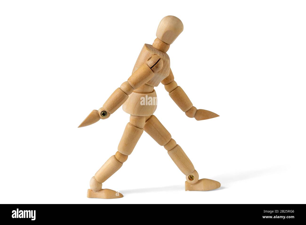 Wooden figure in walk action, isolated on white background Stock Photo ...