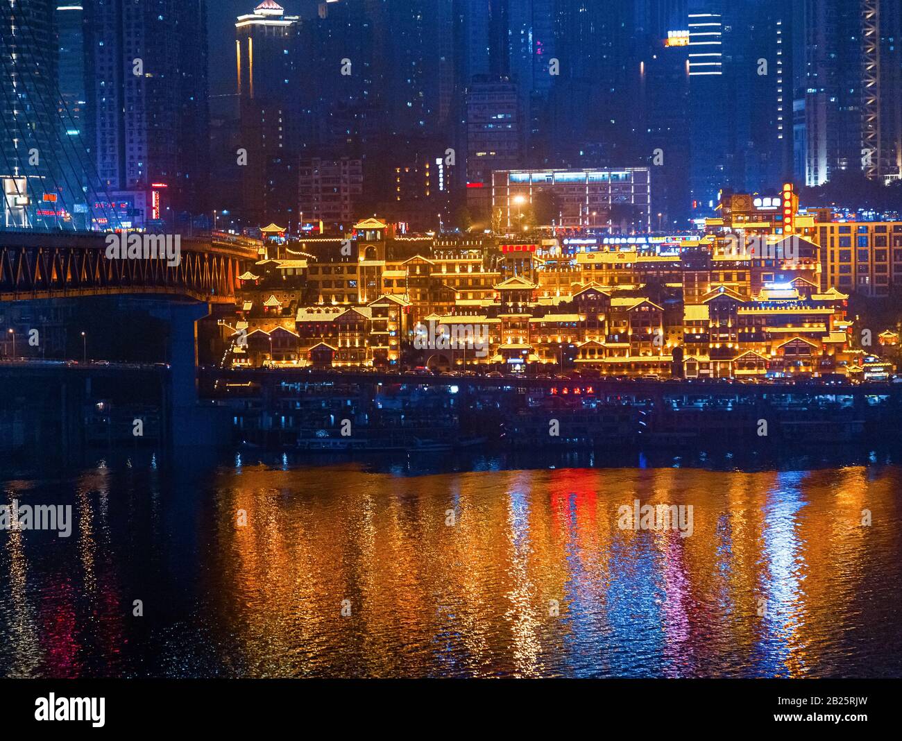 City night view of Chongqing, China. The scenery by the river. The ...