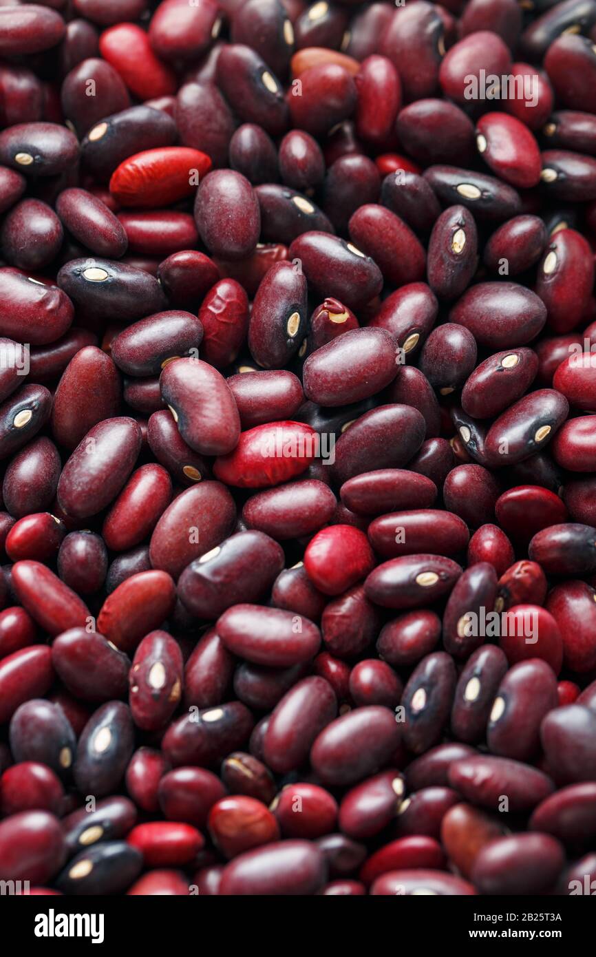 Closeup of a grain of red bean seeds. The texture of the legumes. Close ...