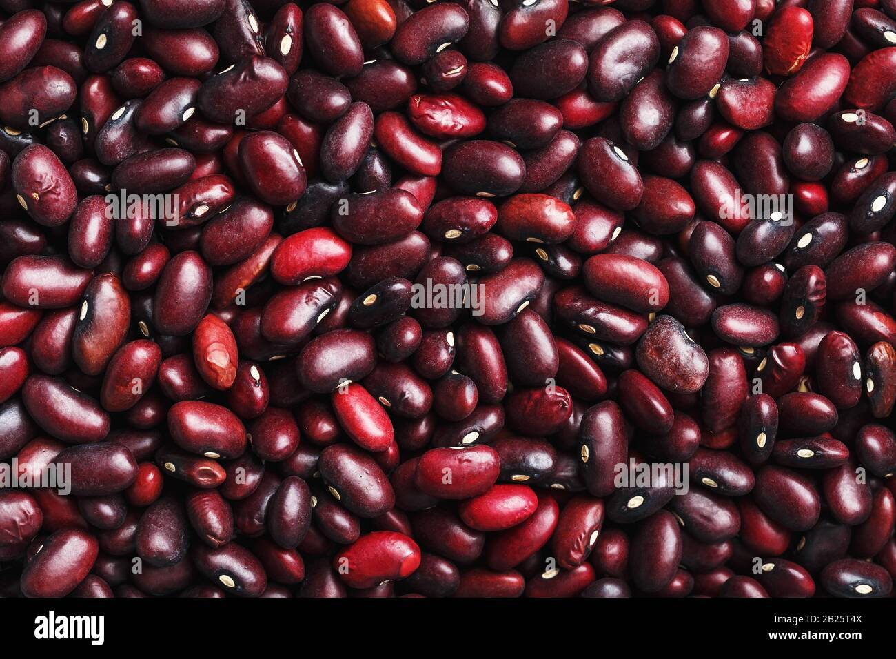 Closeup of a grain of red bean seeds. The texture of the legumes. Close ...