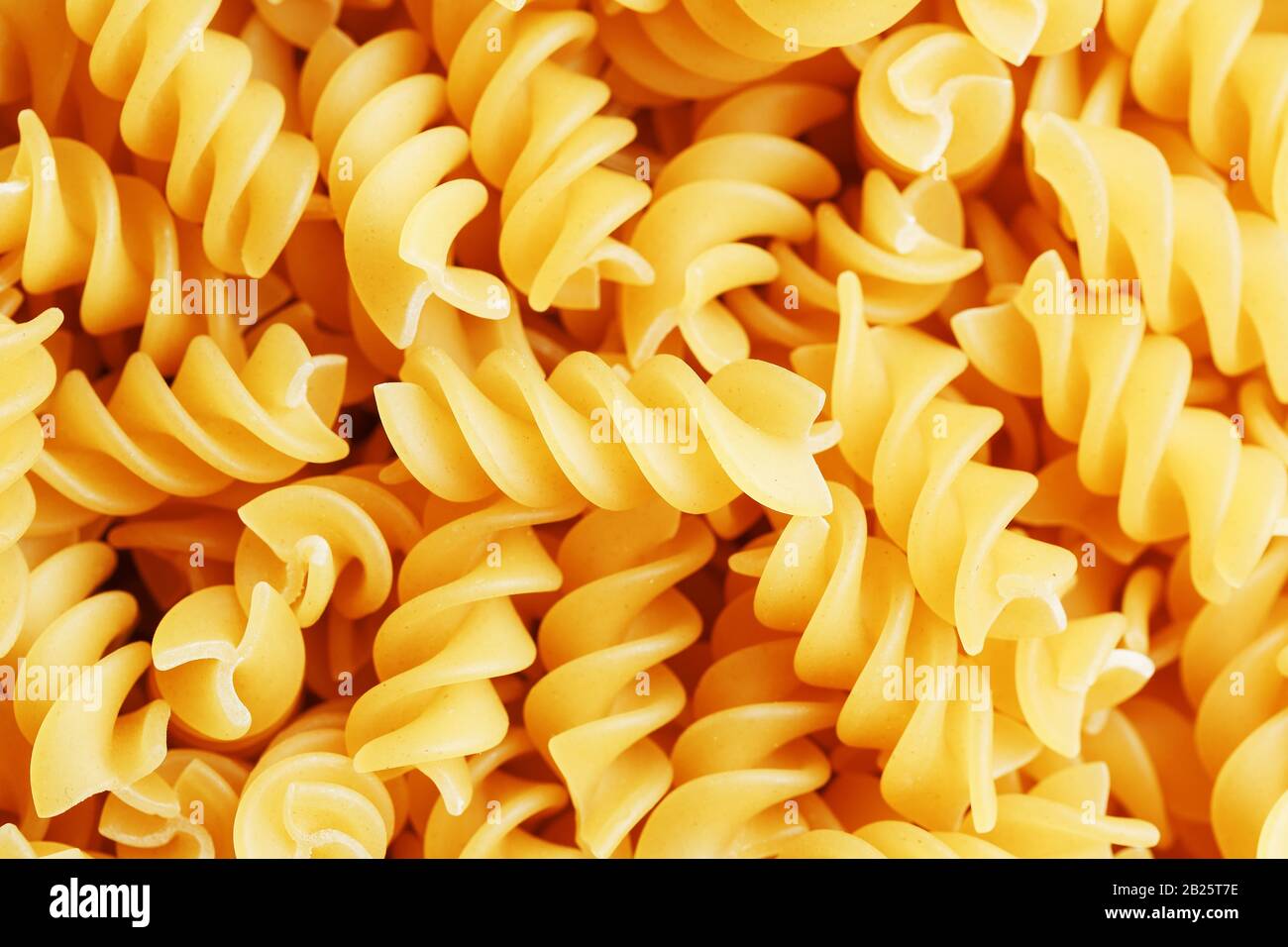 Background texture and pattern of boiled egg noodles in a spiral or ...