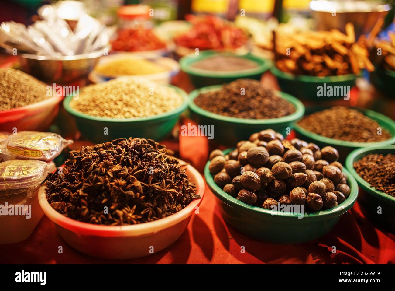 Colorful spices in bags at a market in Goa, Night market India Stock ...