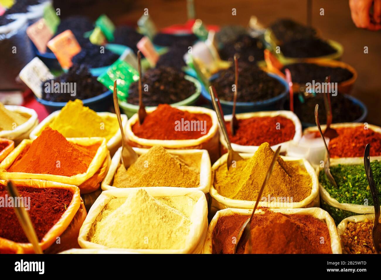 Colorful spices in bags at a market in Goa, Night market India Stock ...