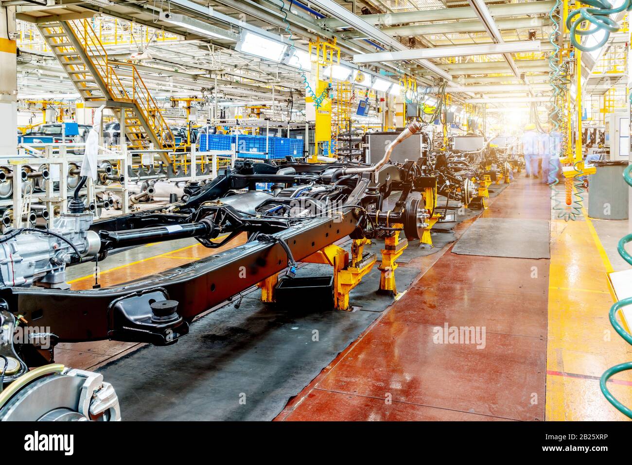 Car production line, skilled workers are working tense Stock Photo - Alamy