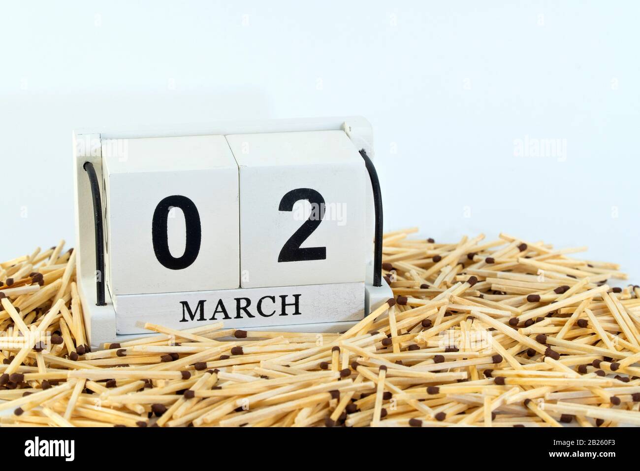 March 2nd. Day 2 of month, wooden calendar on white background. Design ...