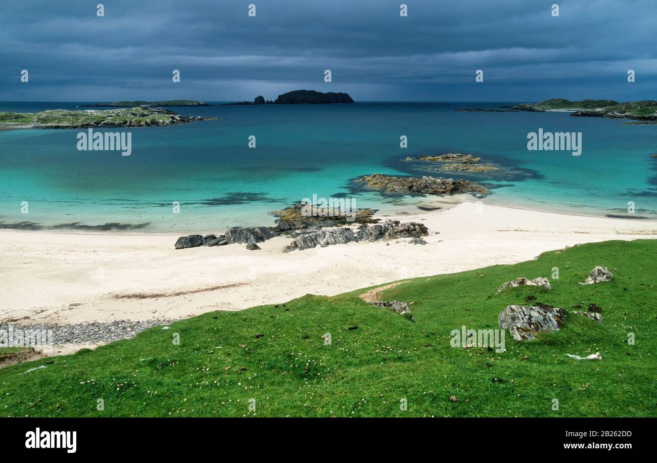 Sandy Bosta beach with dark grey sky above, Bostadh, Great Bernera ...