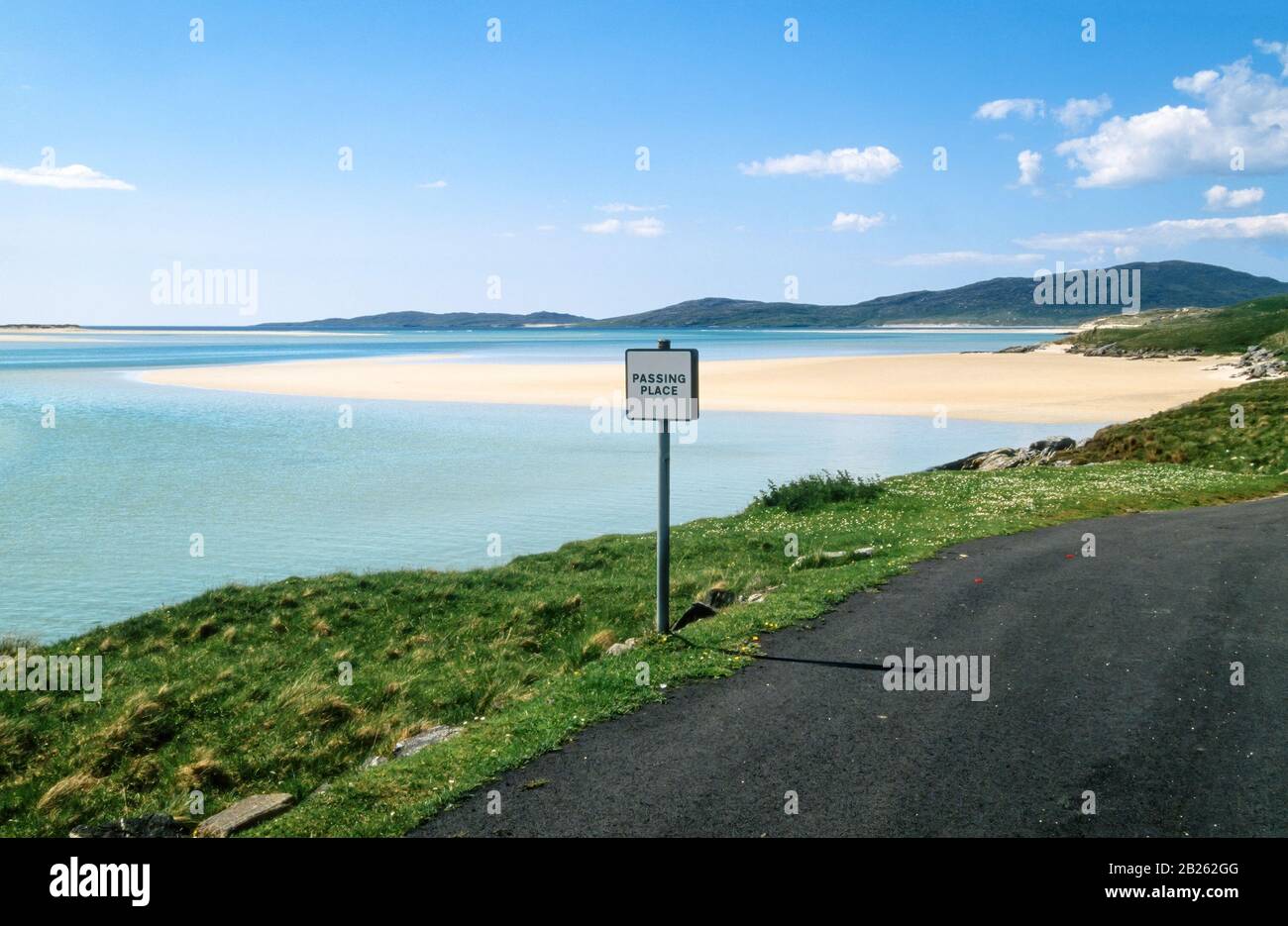Coastal single track road with passing place with Luskentyre ...
