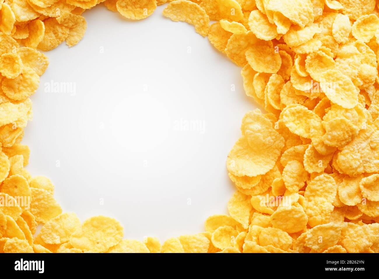 Golden Cornflakes full frame with empty round copy space in the middle ...