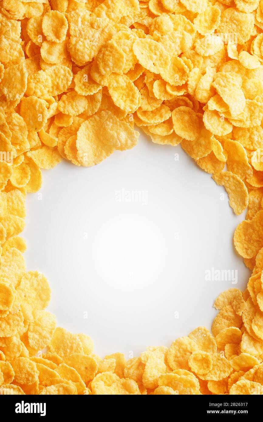 Golden Cornflakes full frame with empty round copy space in the middle ...