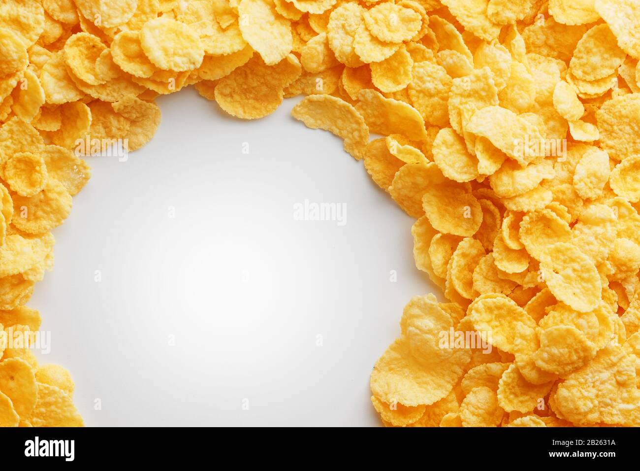 Golden Cornflakes full frame with empty round copy space in the middle ...