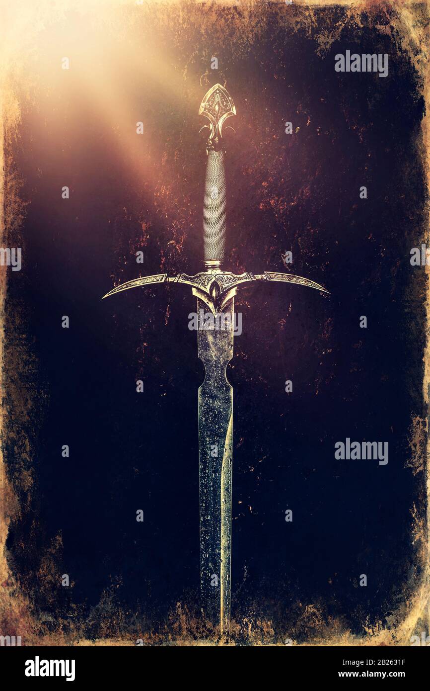 Magyc sword on moss background, old photo effect Stock Photo - Alamy