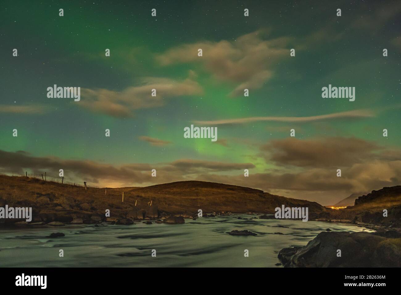 Aurora in Iceland northern lights bright beams rising in green beams ...