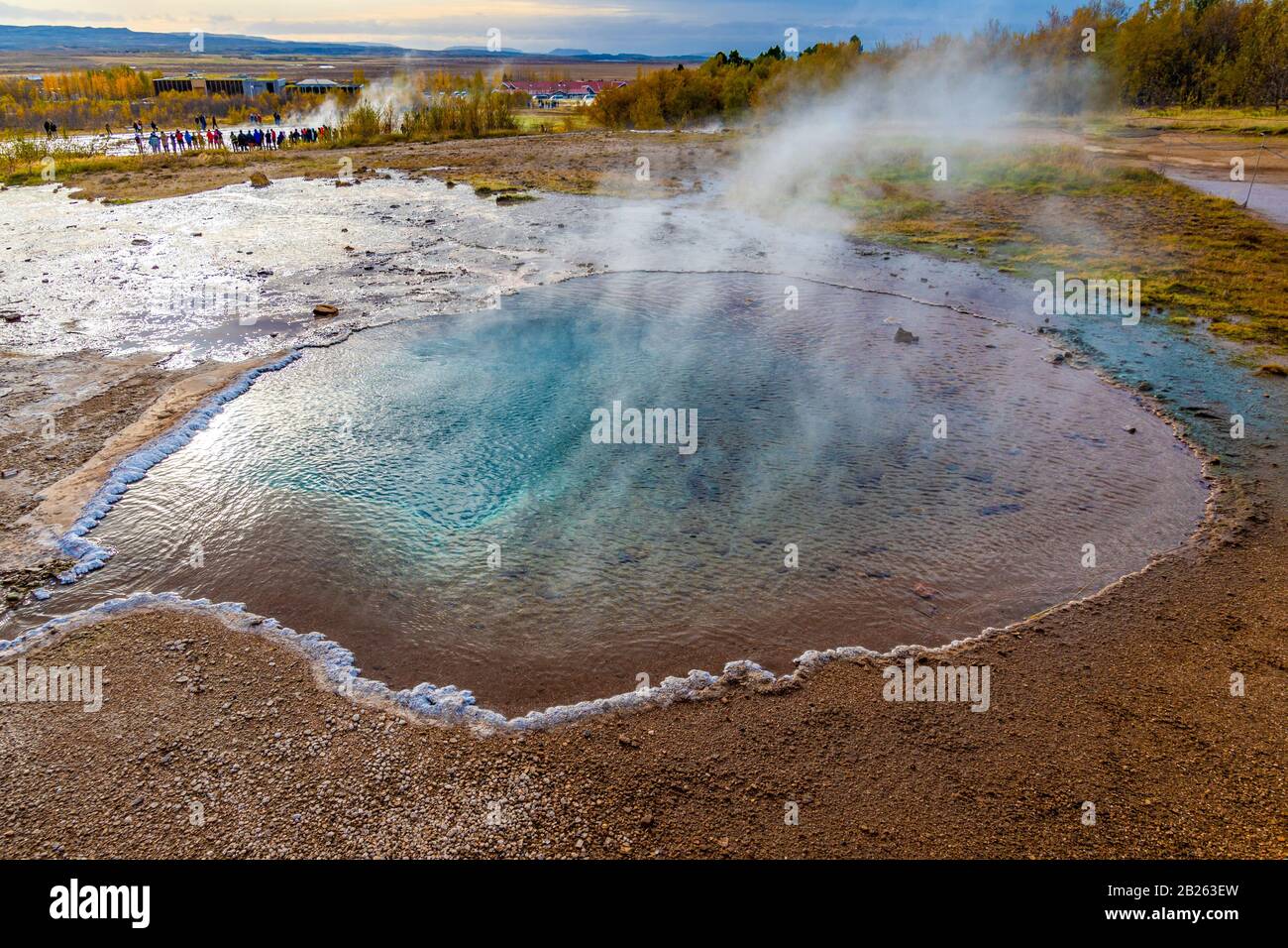 Geysir Golden Circle in Iceland deep blue water in geothermal pool ...