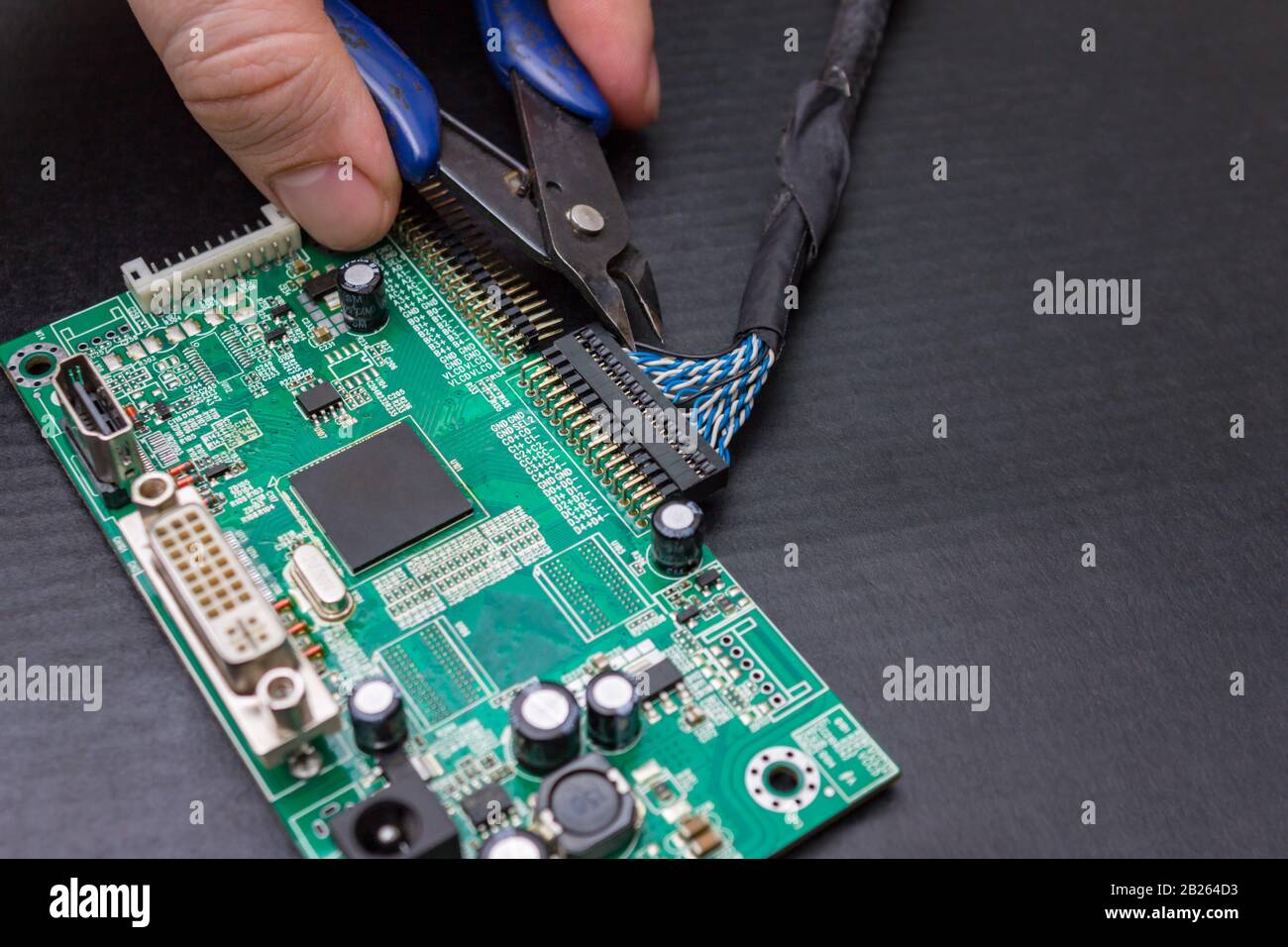 The process of repairing an electronic circuit board monitor. The work ...