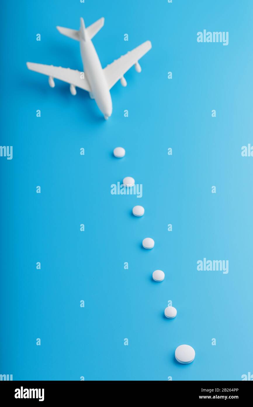 White model of a passenger plane with dotted trajectory points isolated ...