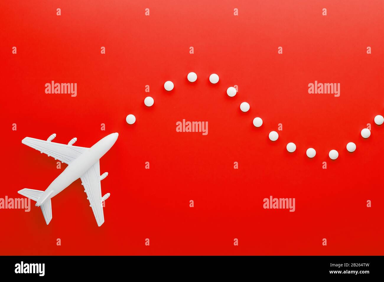 White passenger plane with trajectory points, as on a route map ...