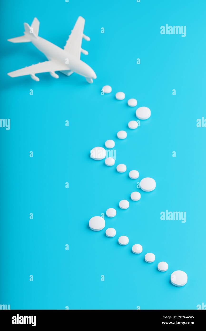 White model of a passenger plane with dotted trajectory points isolated ...