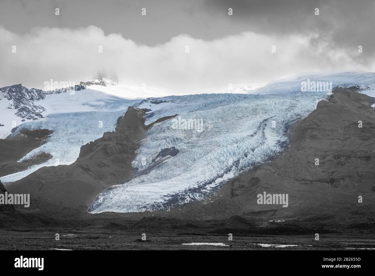 Vatnajoekull glacier in Iceland spiky crevasse in black and white with ...