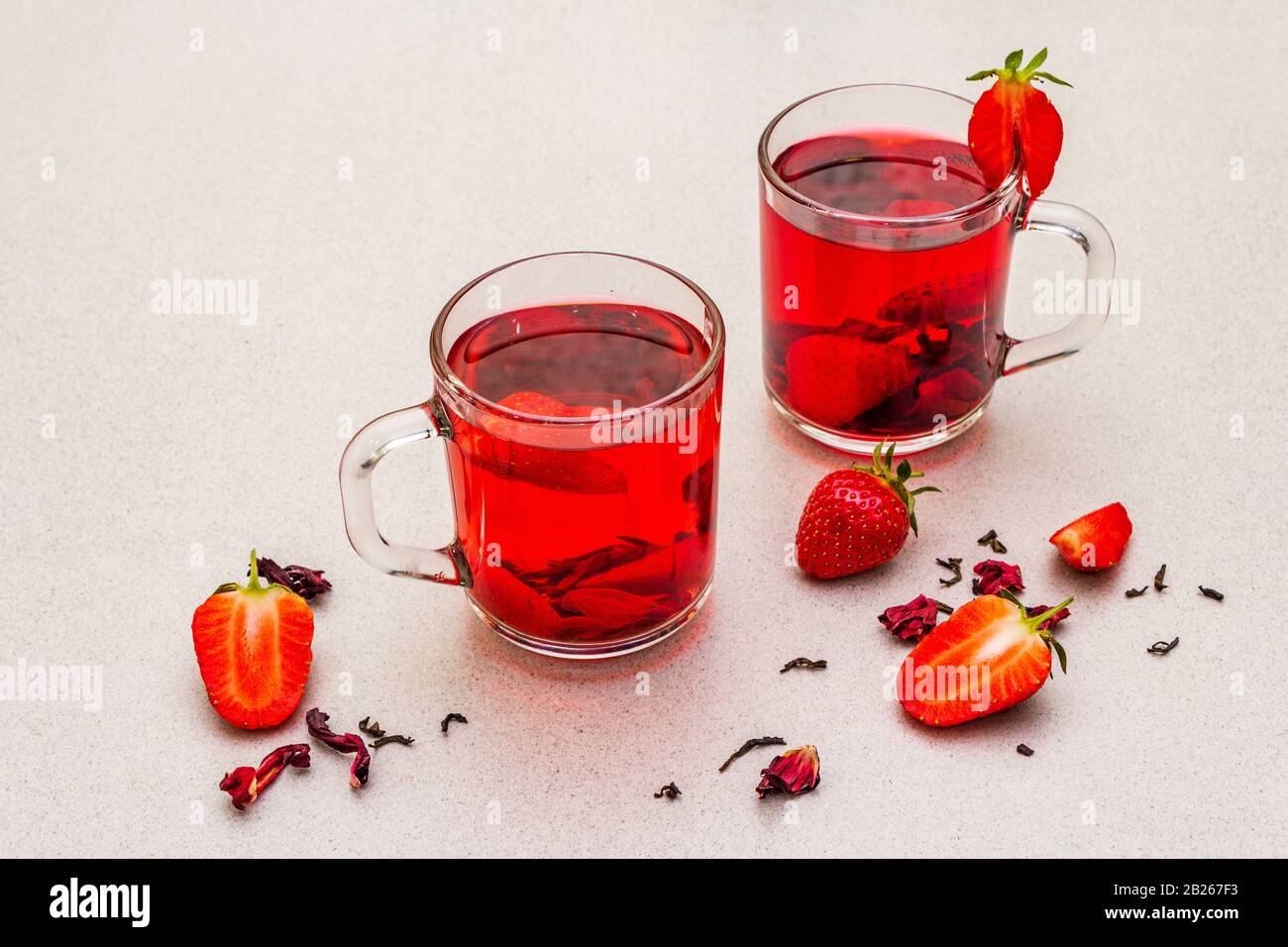 Summer strawberry hibiscus green tea. Healthy hot organic drink served ...