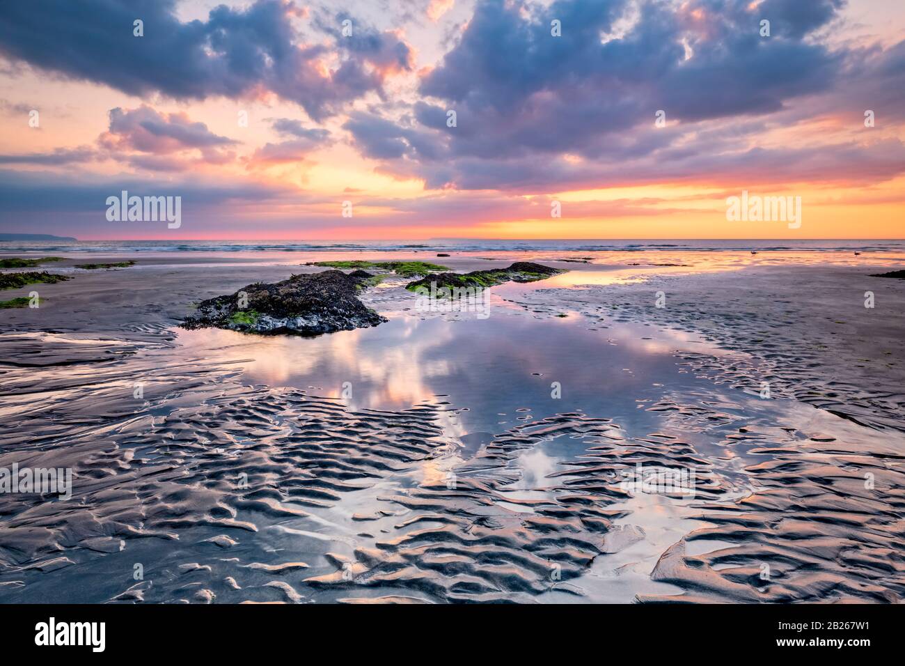 Dramatic sunset skies over the North Devon coast, romantic glow ...