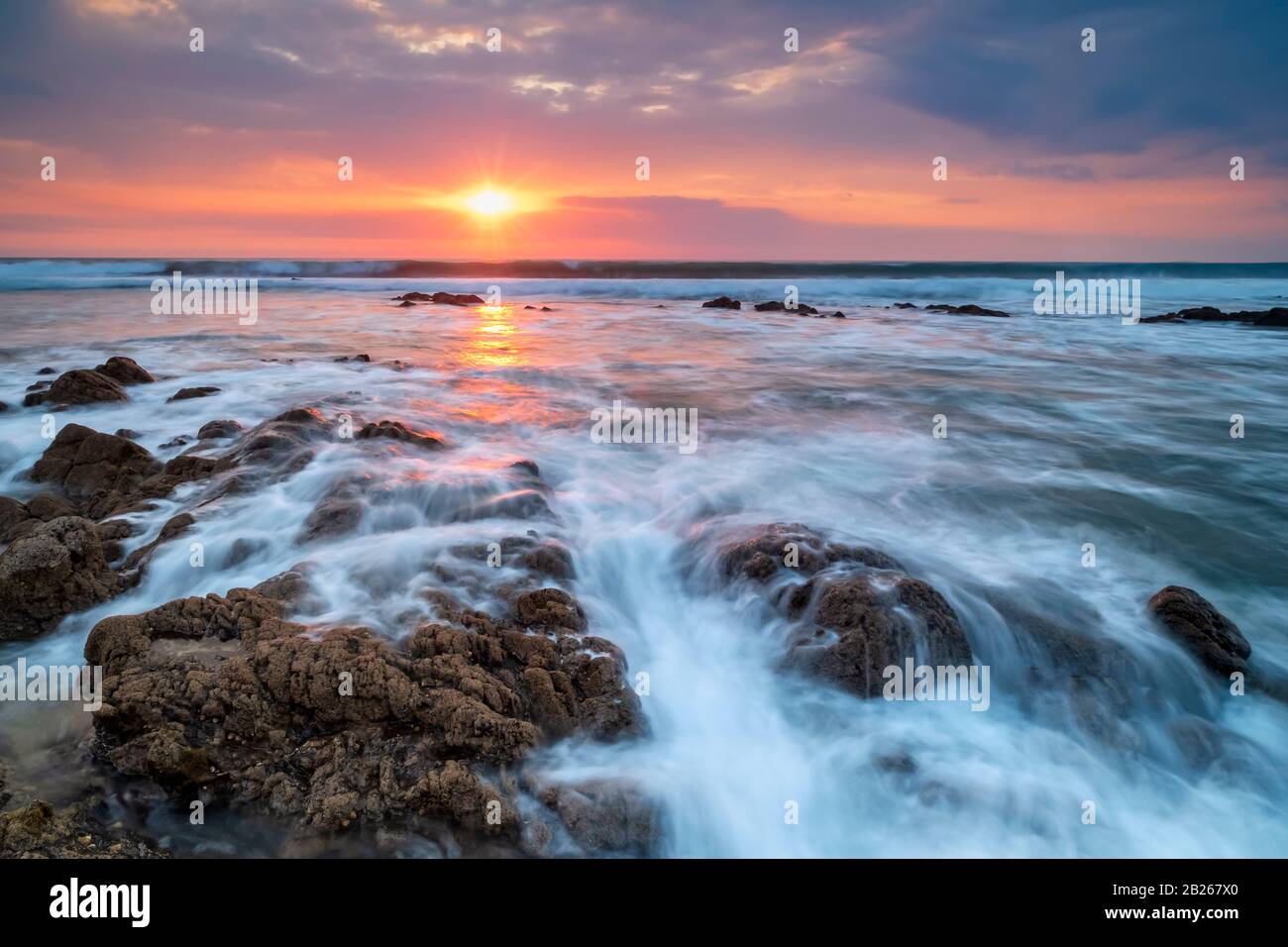 Dramatic sunset skies over the North Devon coast, romantic glow ...