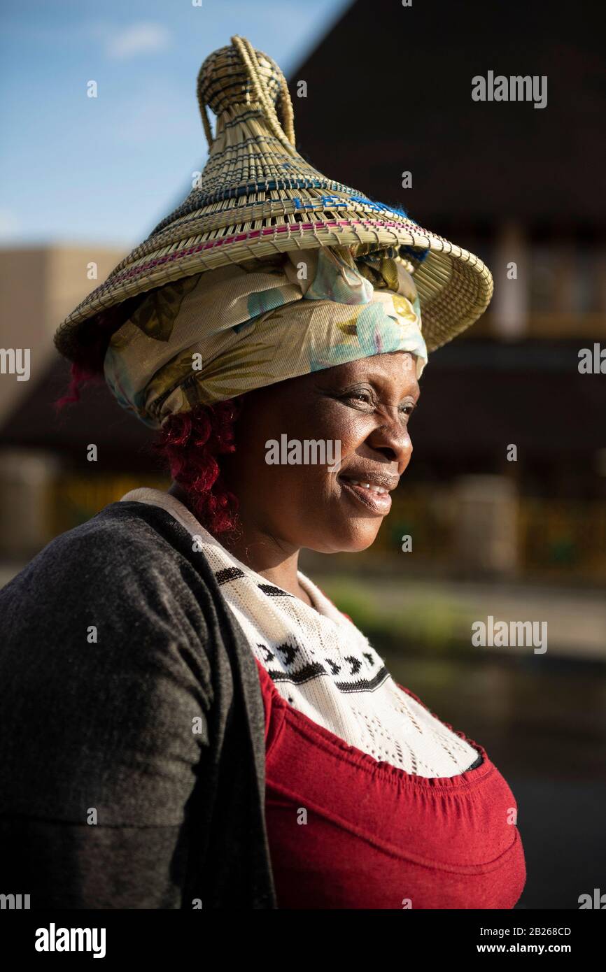 Woman selling basotho hats, Maseru, Lesotho Stock Photo - Alamy