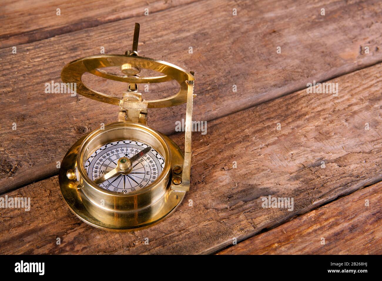 Golden compass on old hi-res stock photography and images - Alamy