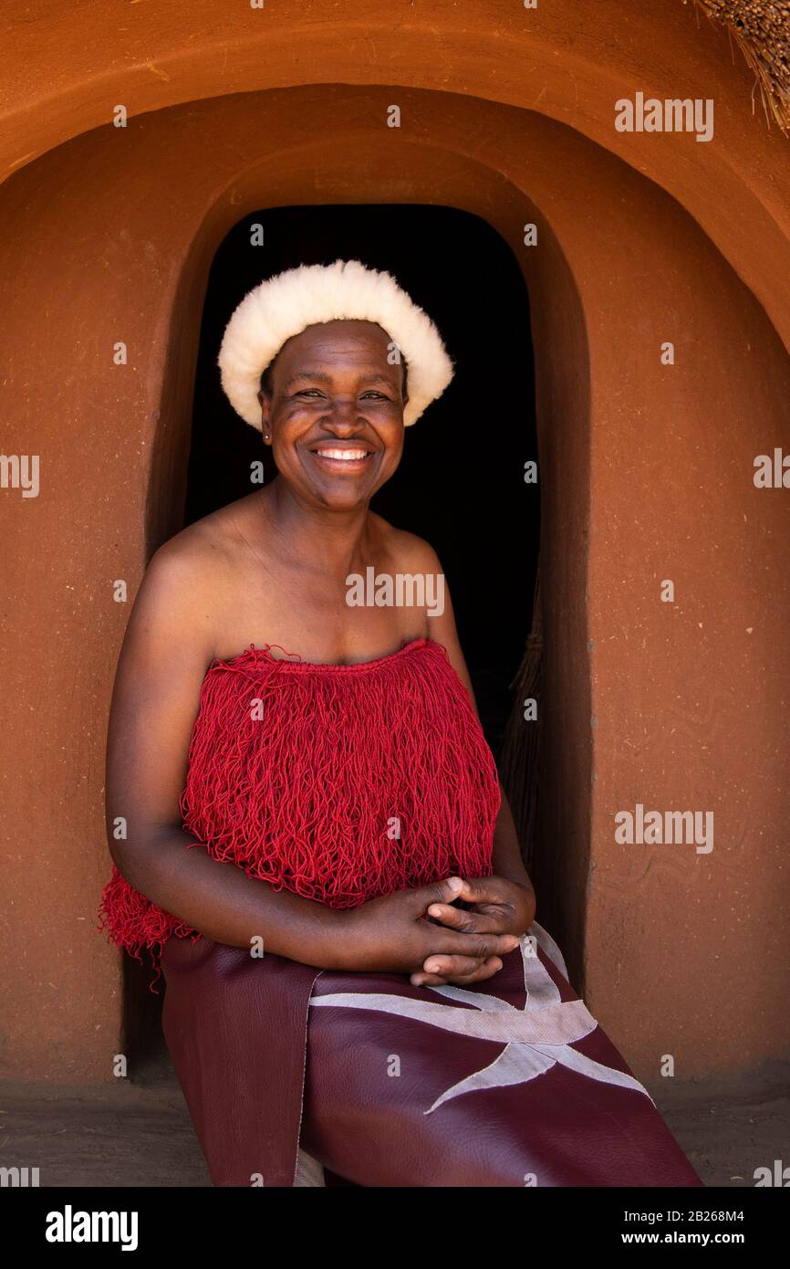 Basotho woman in a traditional hut, Thaba Bosiu Cultural Village ...