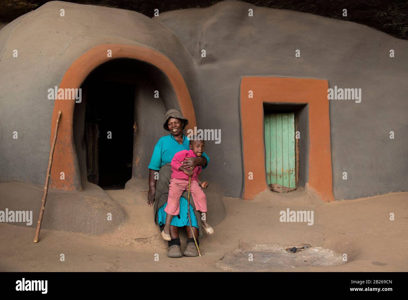 Woman with child at Ha Kome cave village, Lesotho Stock Photo - Alamy