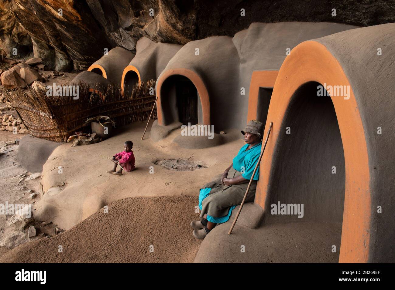 Woman with child at Ha Kome cave village, Lesotho Stock Photo - Alamy