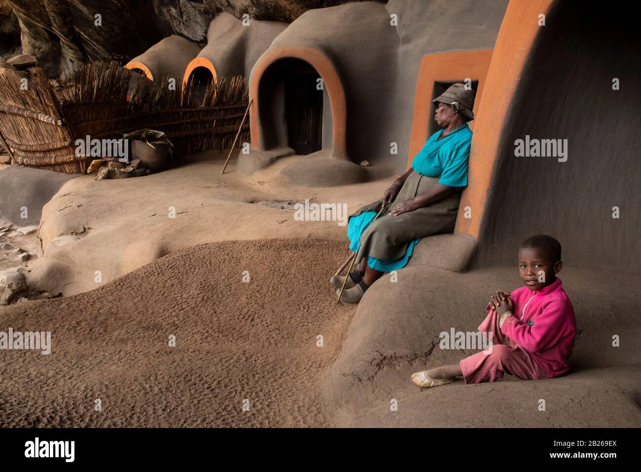 Woman with child at Ha Kome cave village, Lesotho Stock Photo - Alamy