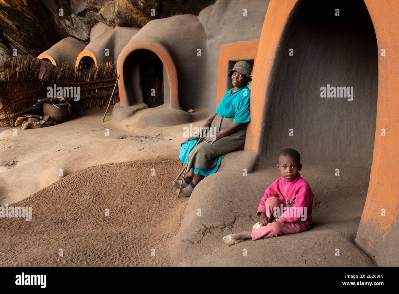Woman with child at Ha Kome cave village, Lesotho Stock Photo - Alamy