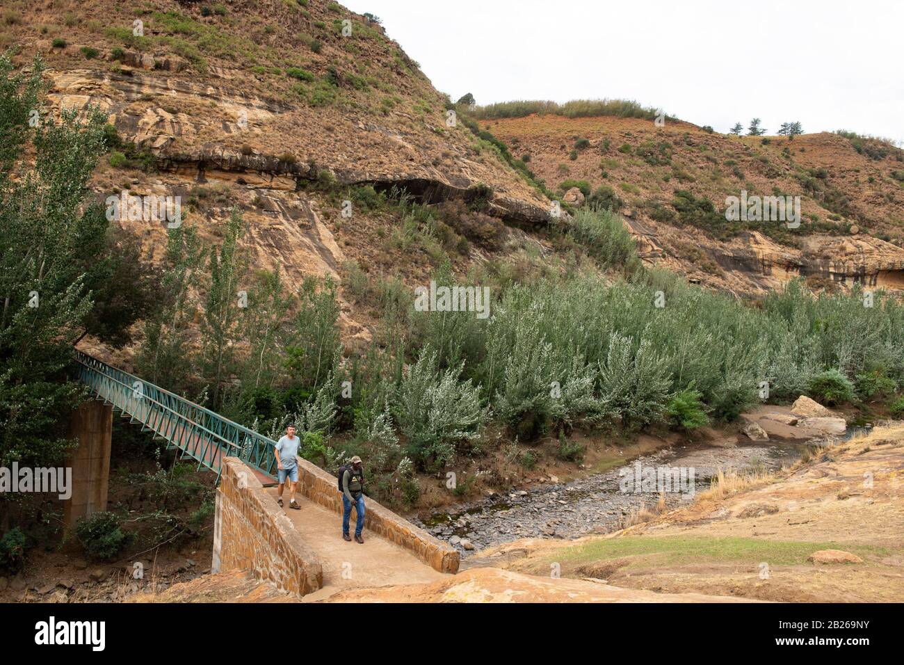 Walking bridge crossing the Liphiring River to the Ha Baroana rock ...