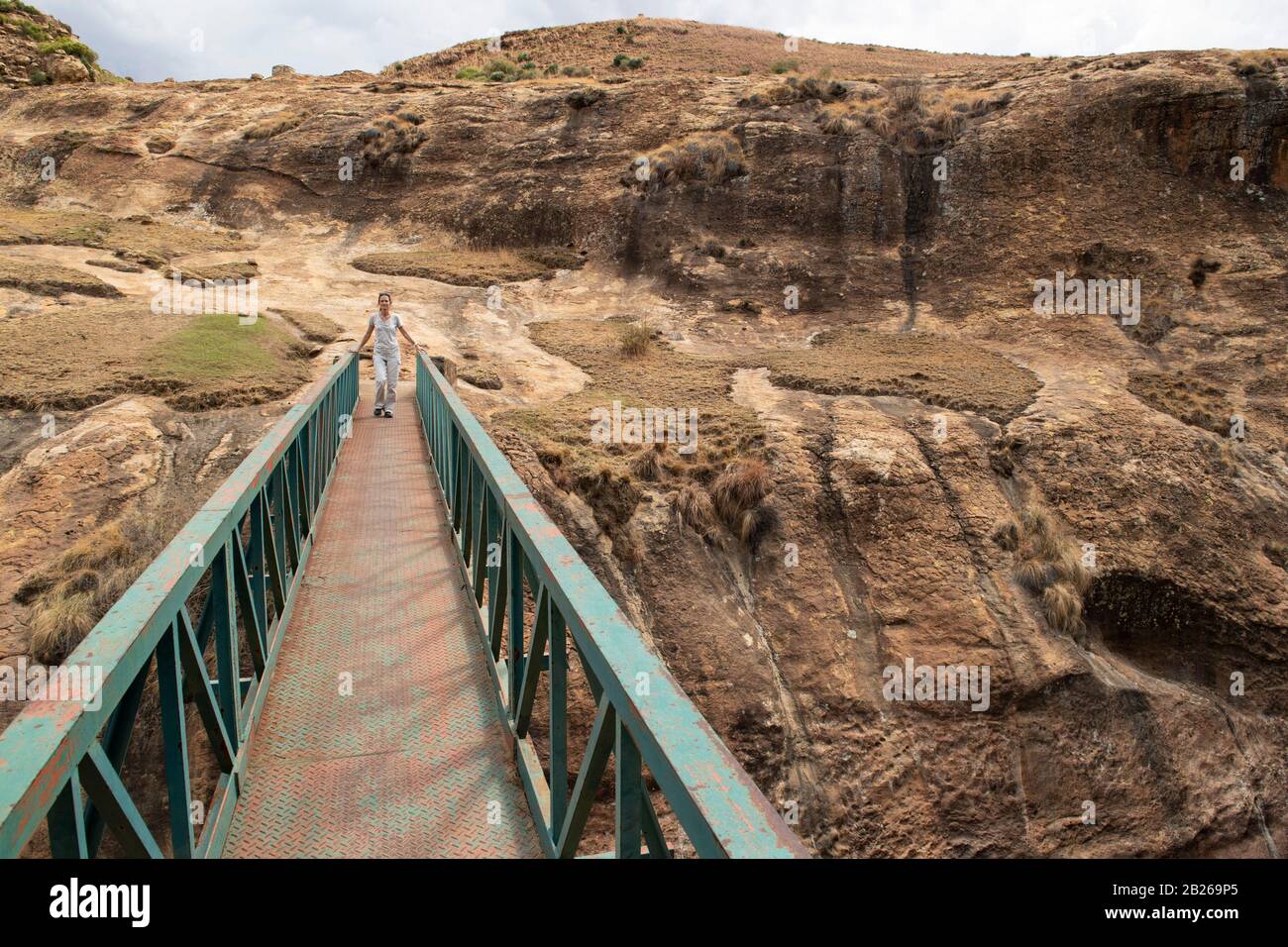 Walking bridge crossing the Liphiring River to the Ha Baroana rock ...