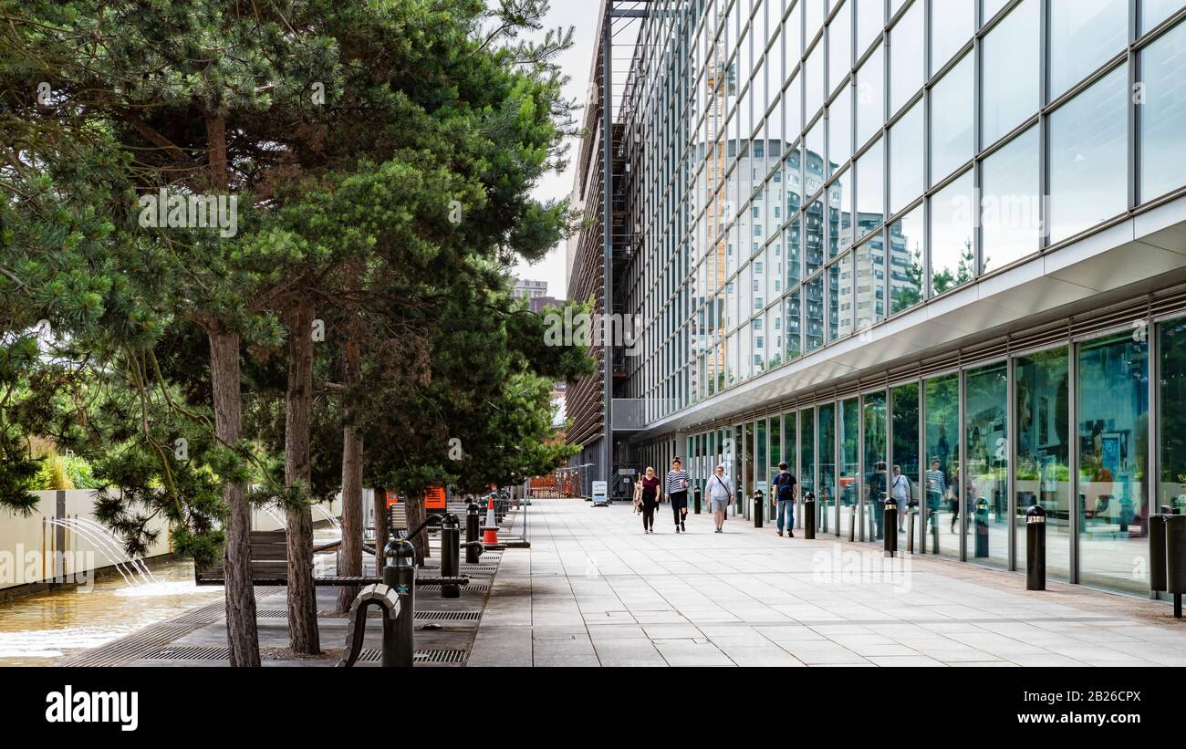 Millennium Point exterior with the pedestrian plaza and trees Stock ...