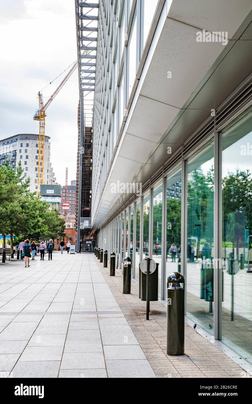 Millennium Point exterior with the pedestrian plaza and trees Stock ...