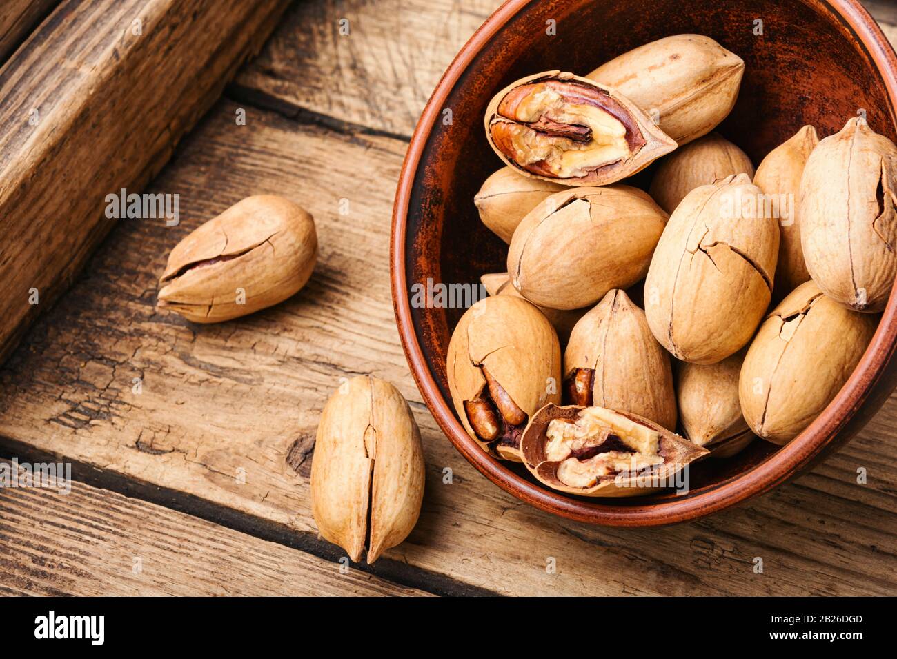 Pile pecan nuts cracked in hi-res stock photography and images - Alamy